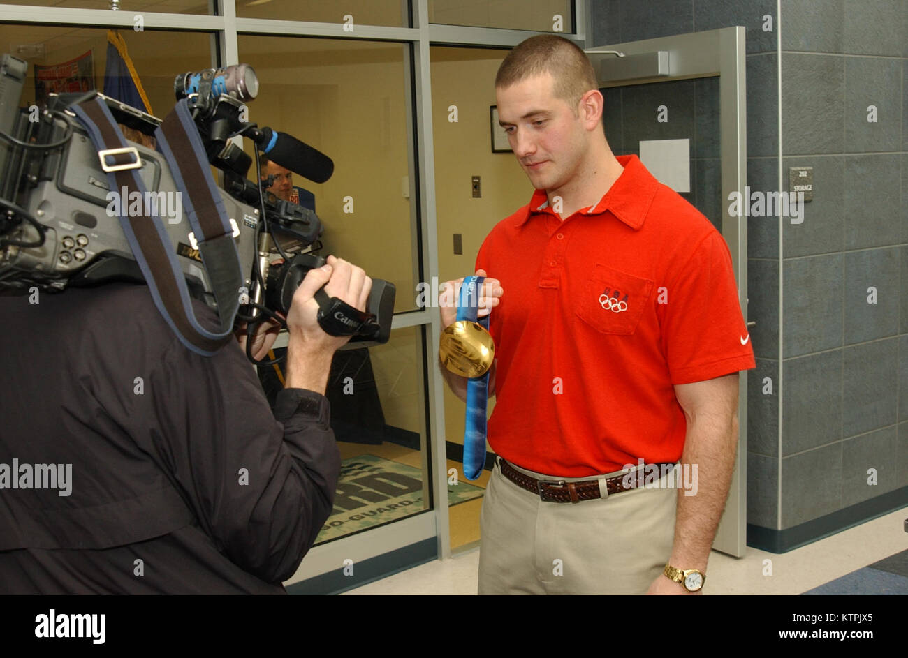 New York Army National Guard PFC Justin Olsen speaks with members of ...