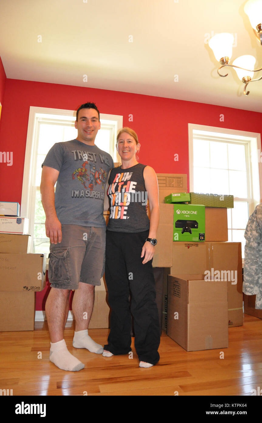 CLIFTON PARK, N.Y. -- Maj. Brian Bonanno (left) and his wife Maj. Amy ...
