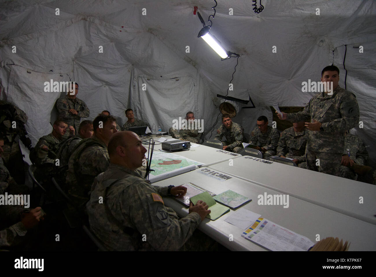 Soldiers host an air mission brief to coordinate the training exercise ...