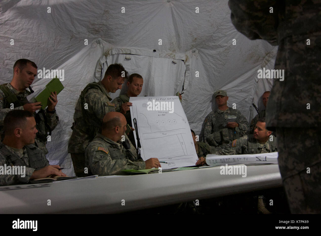 Soldiers host an air mission brief to coordinate the training exercise ...