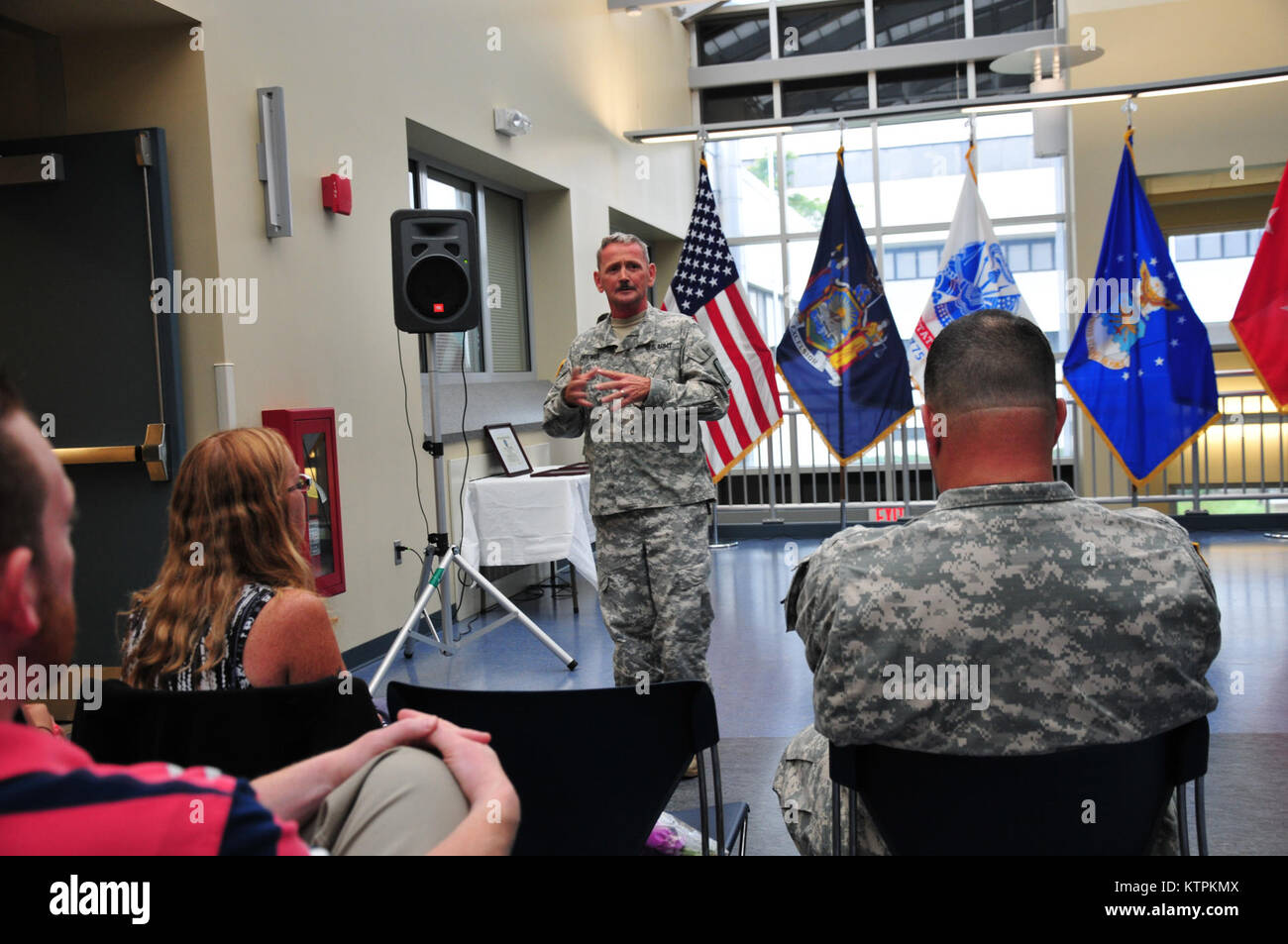 Lt. Col. Dana Brewer addresses the crowd during his retirement ceremony ...