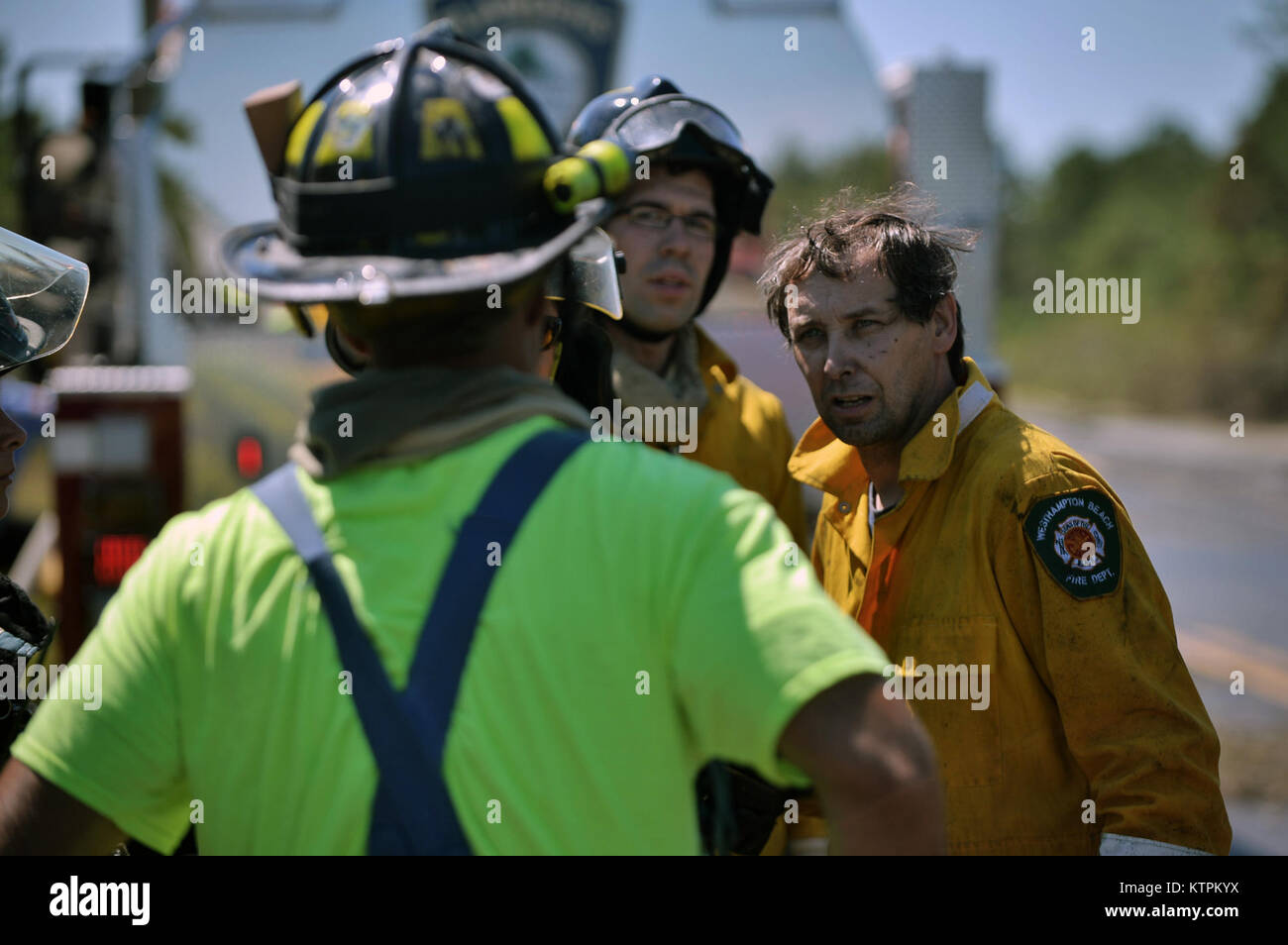 WESTHAMPTON BEACH, NY - Firefighters from the Westhampton Beach Fire ...