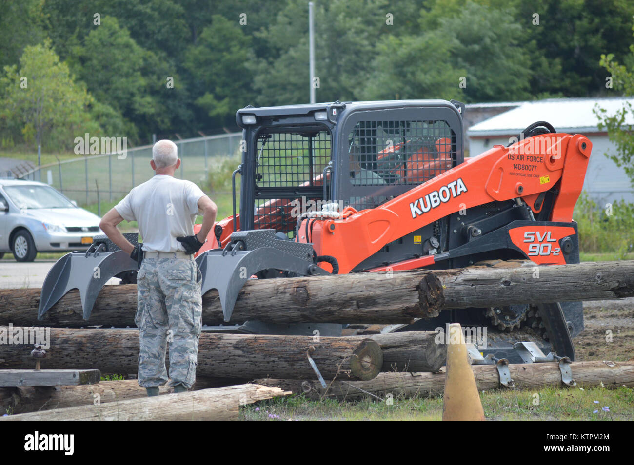 Chief Master Sgt. Mark Schaible instructs A firefighter with the 109th ...
