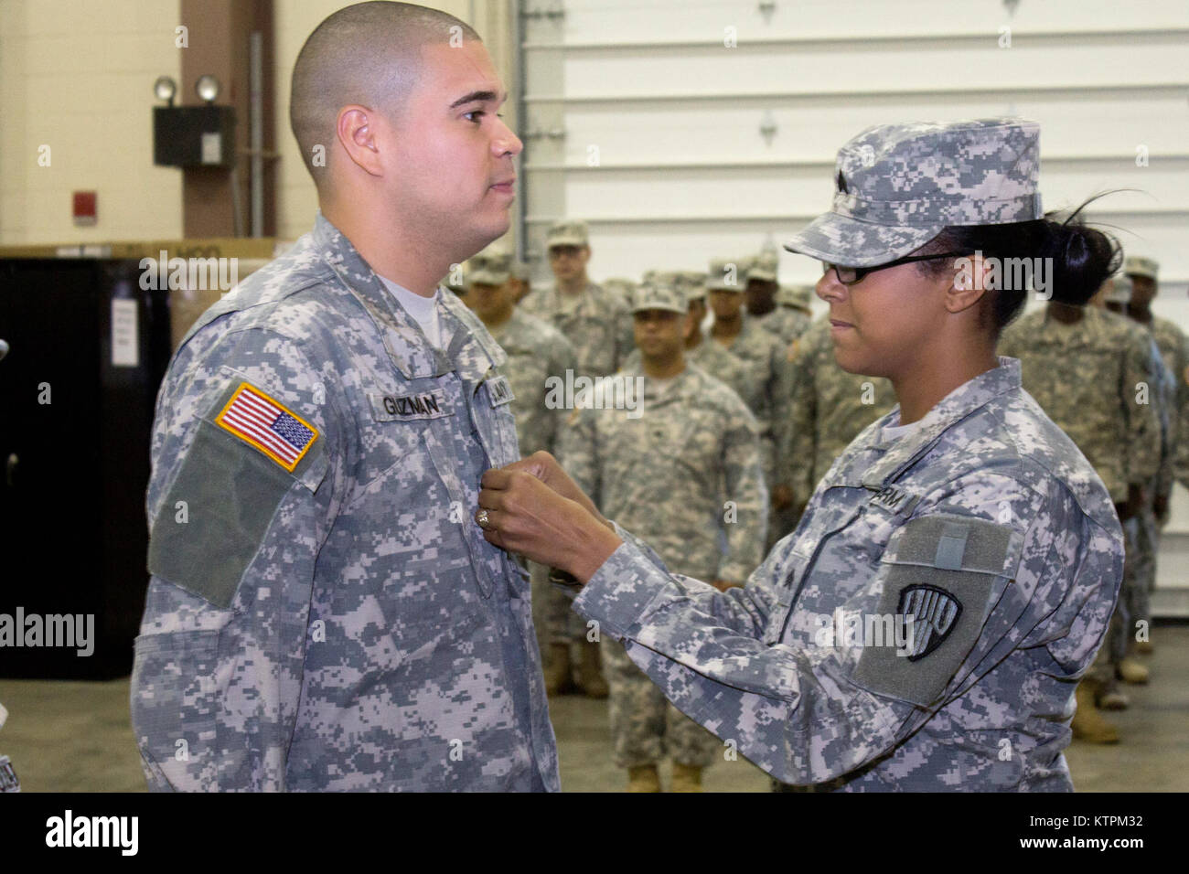 Spc. Raymond Guzman and Spc. Diana Pani of the 369th Sustainment ...