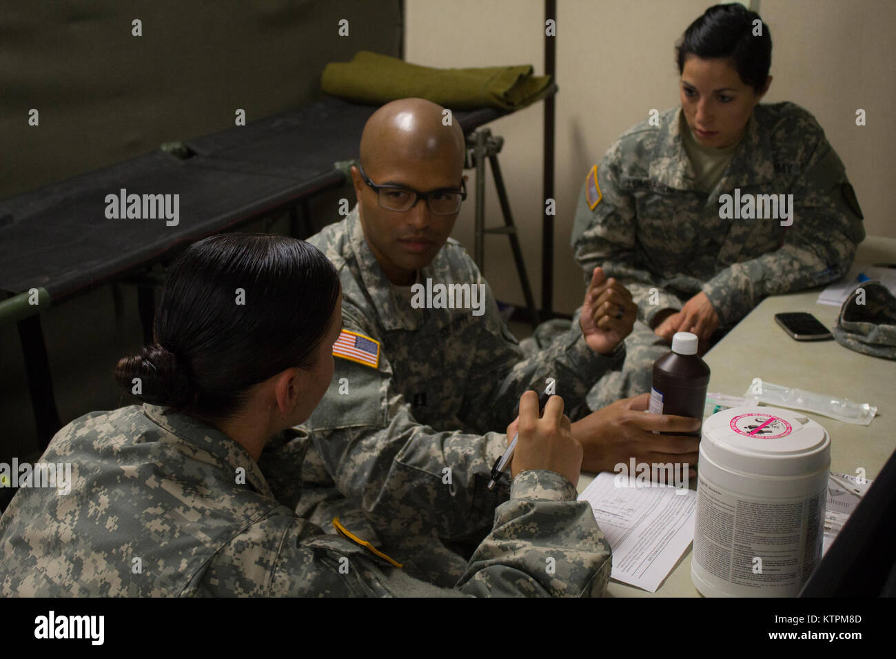 Capt. Edgardo Sosa provides training to soldiers from the 369th ...