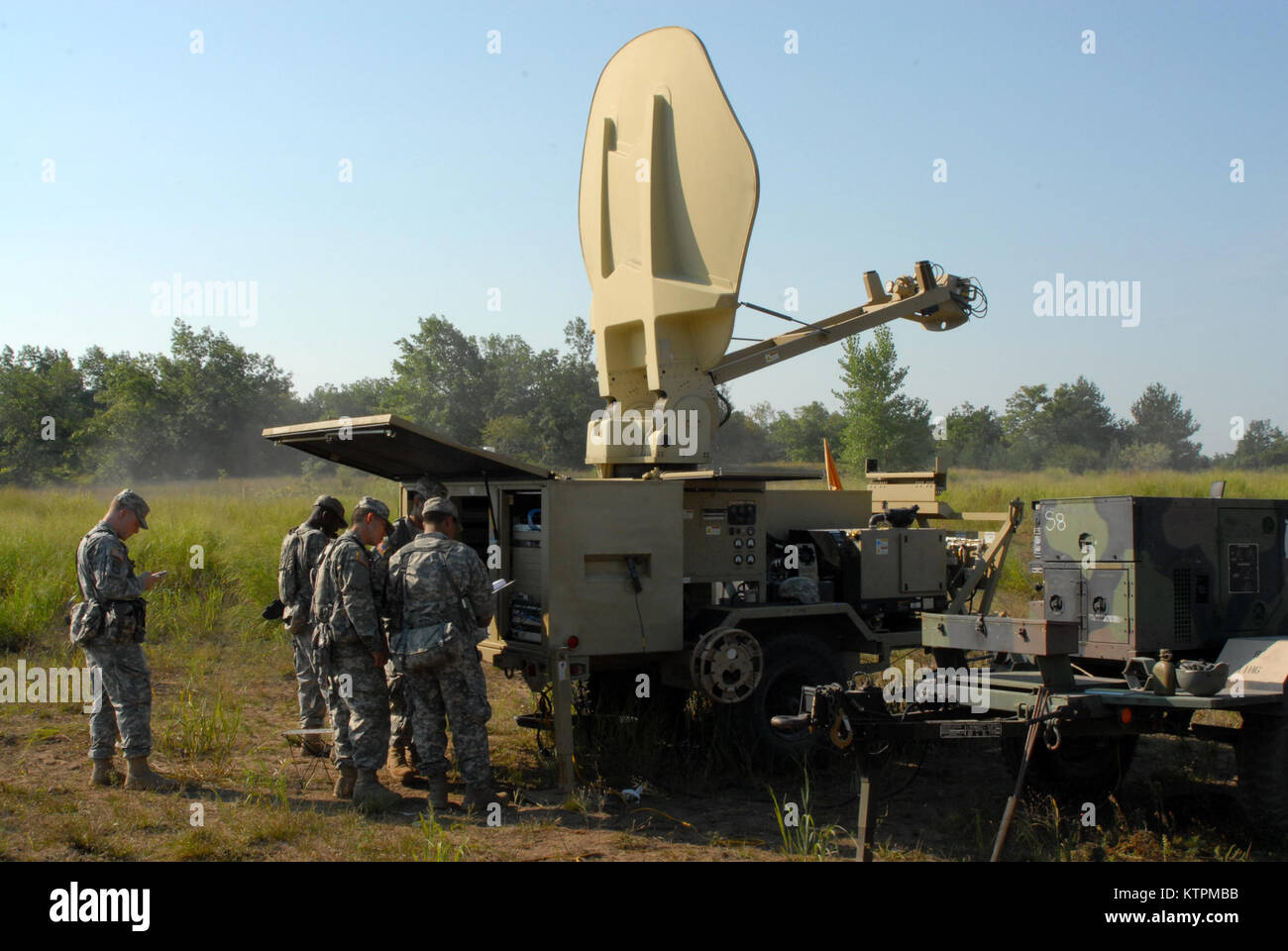 Soldiers of the 101st Signal Battalion operate a Satellite ...