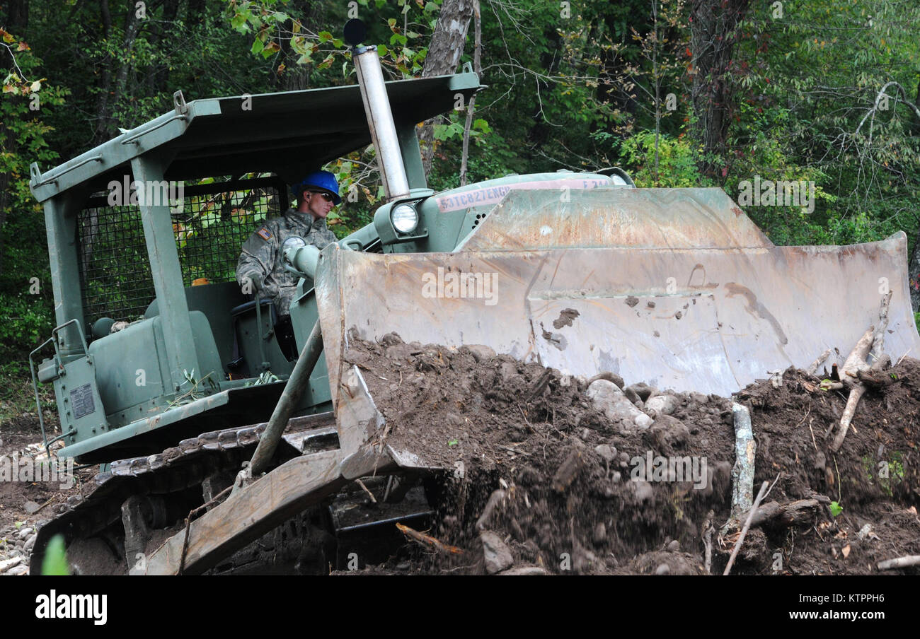 Spc. Dakota Nelson, a heavy equipment operator with the 827th Engineer ...