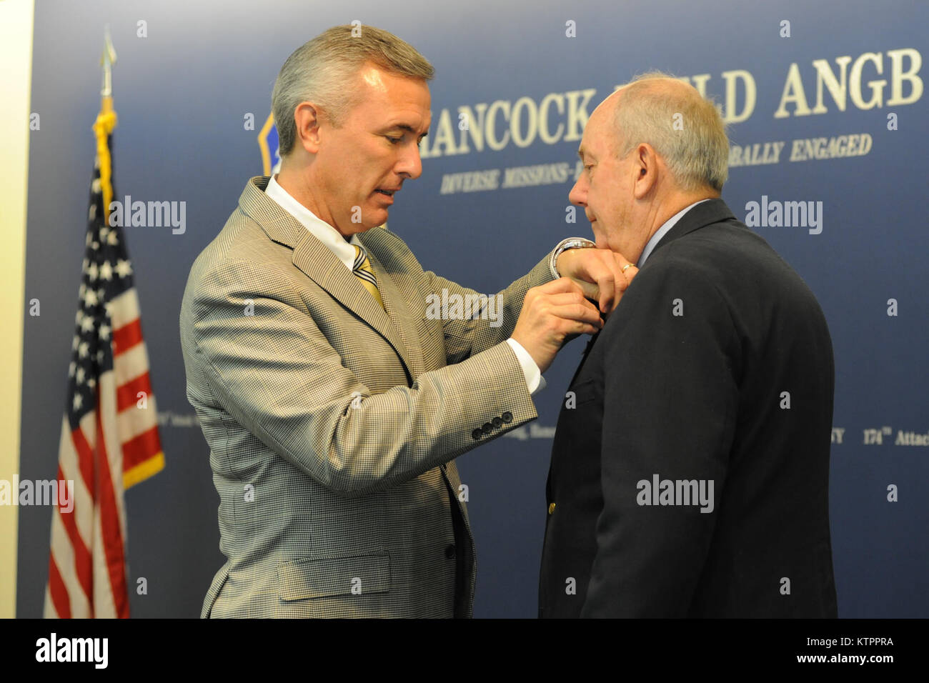 Syracuse, NY – U.S. Rep. John Katko presents two military veterans from ...