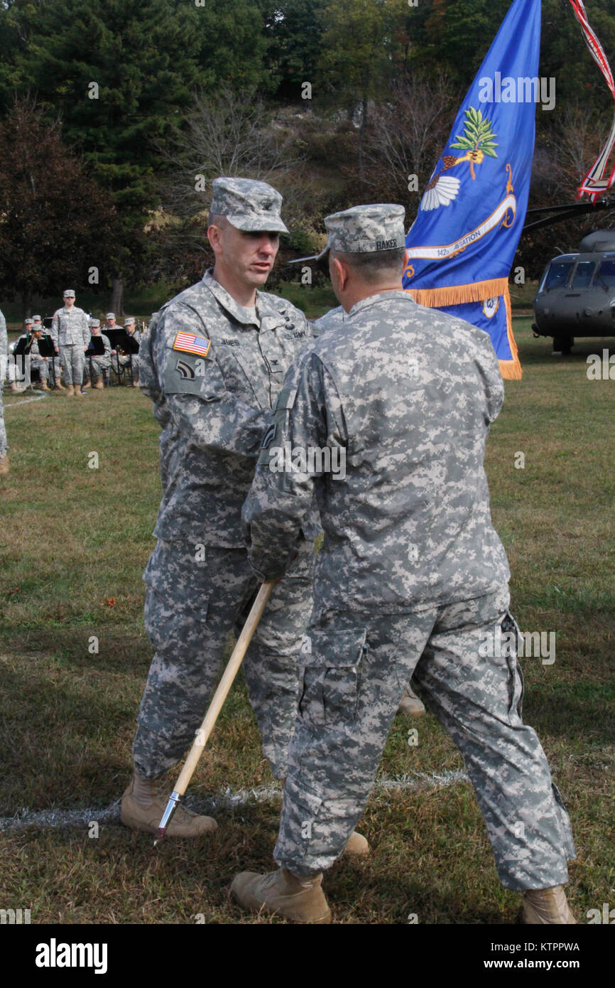 Col. Jack James, the 42nd Combat Aviation Brigade commander, receives ...