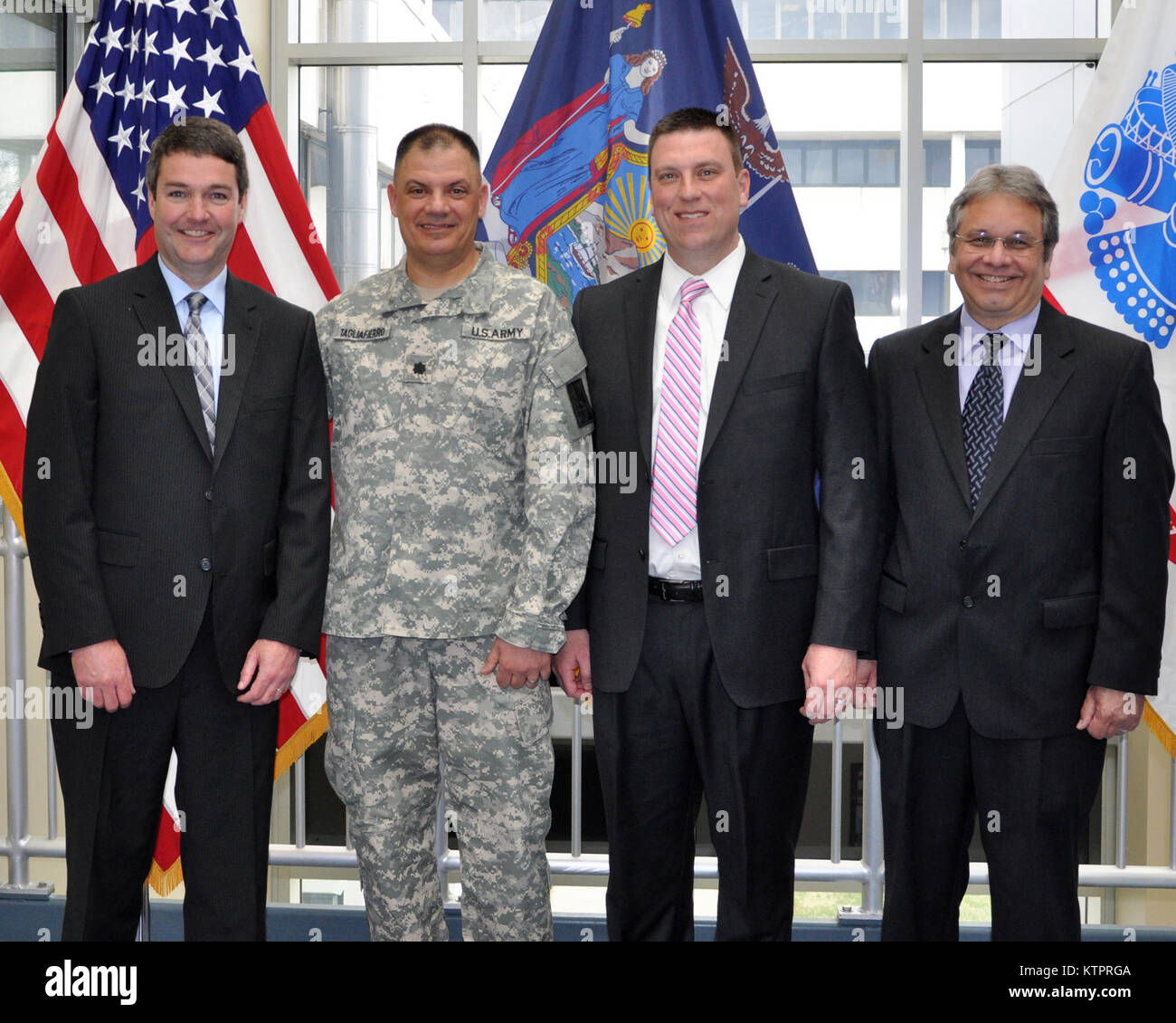 LATHAM, N.Y. -- NYARNG Lt. Col. Micheal Tagliafierro poses with his co ...