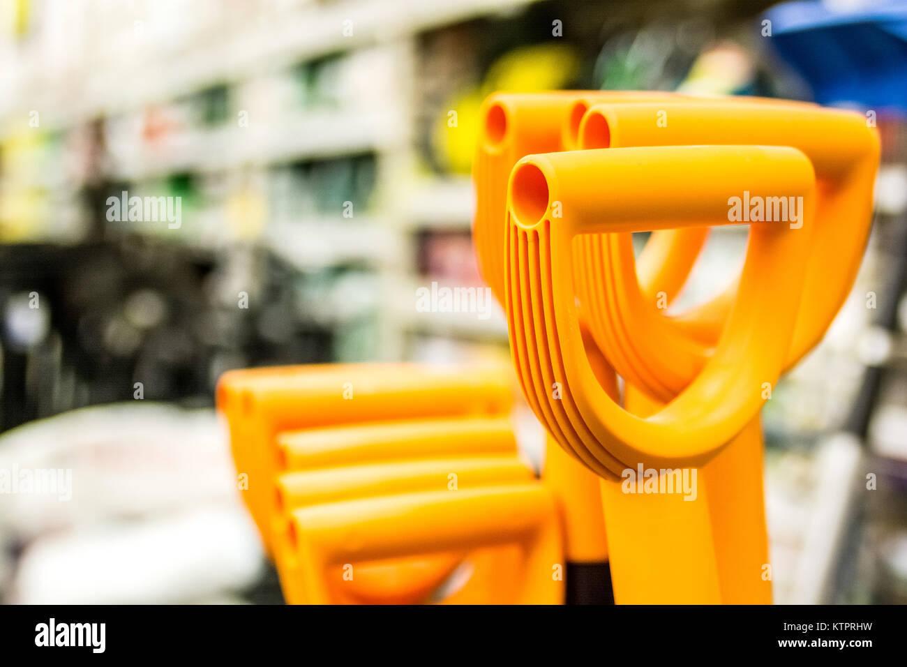 Orange plastic spade hi-res stock photography and images - Alamy