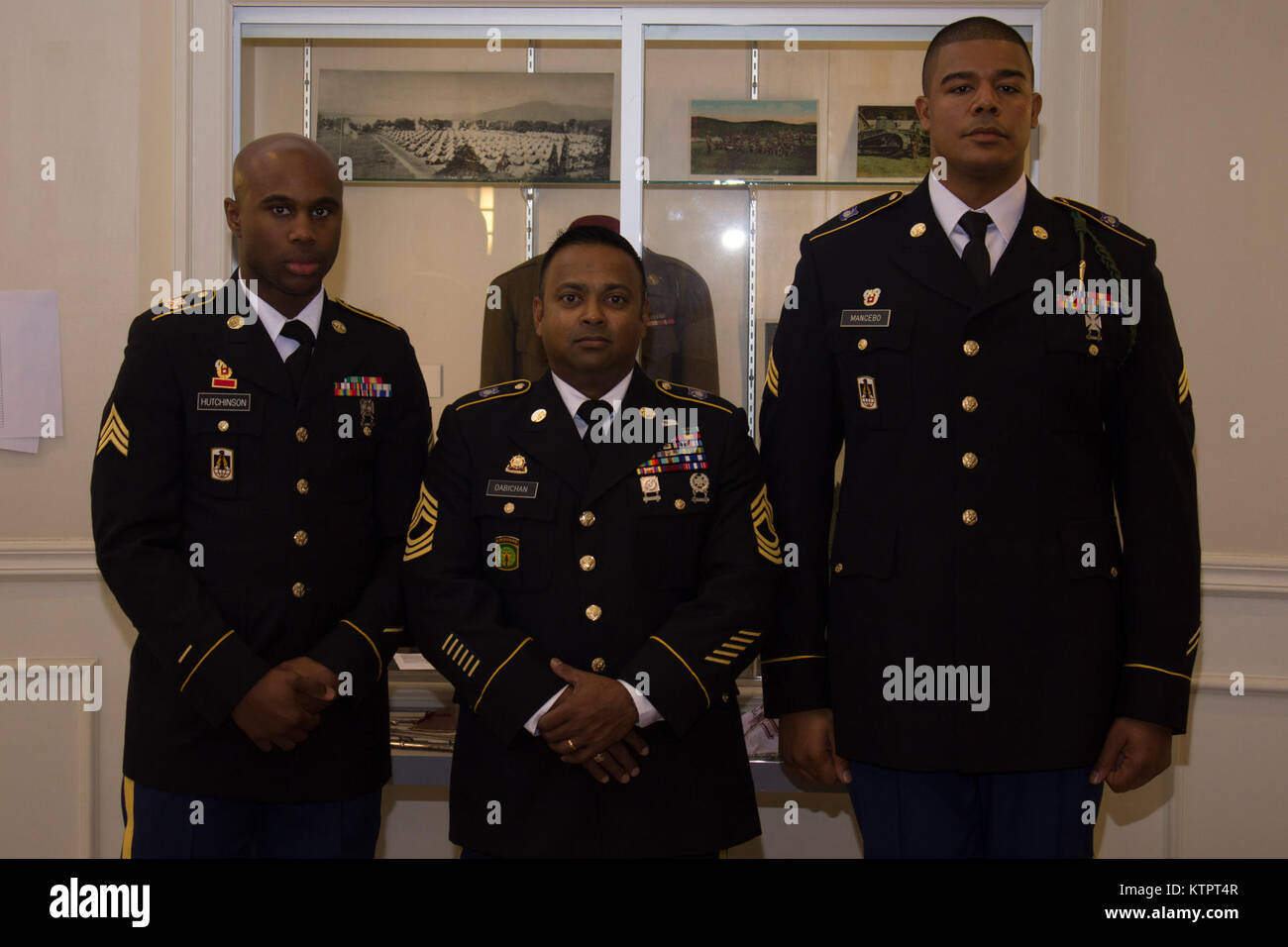 Newly inducted sergeants in the Noncommissioned Officer Corp pose for a ...