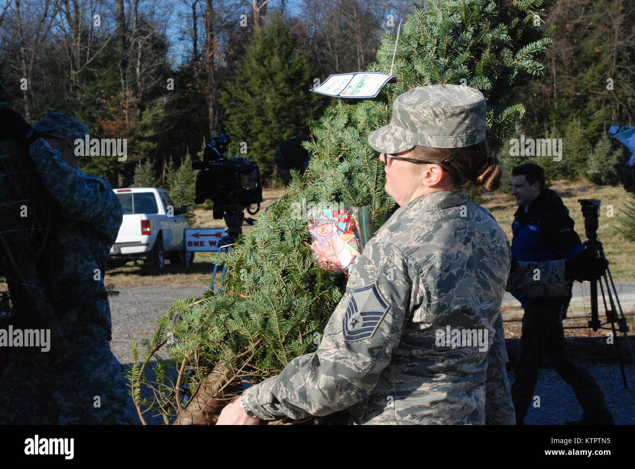 New York Air National Guard Master Sgt. Jennifer Dippo helps load ...