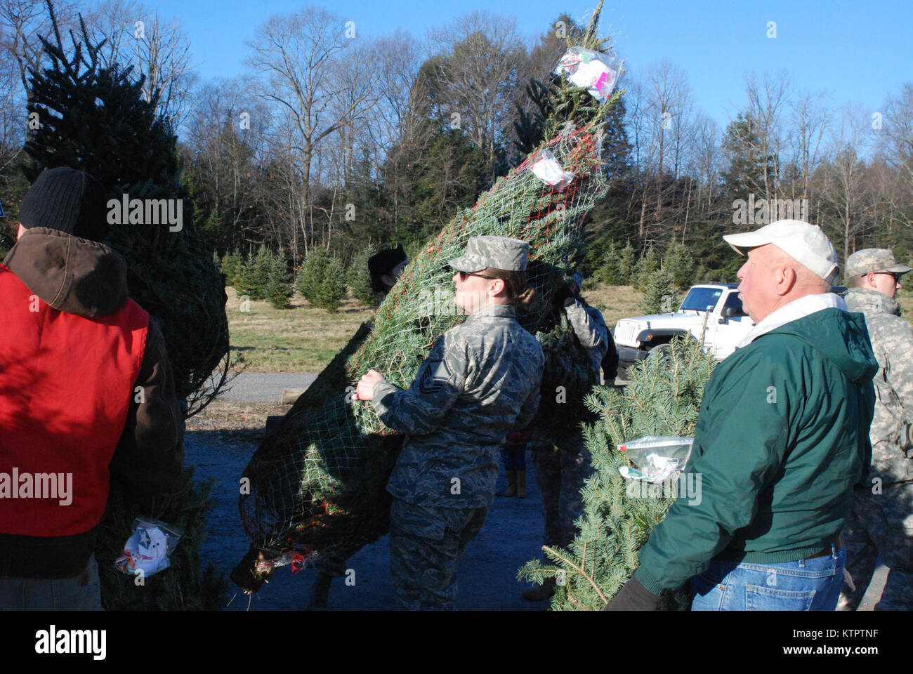 New York Air National Guard Master Sgt. Jennifer Dippo helps load ...