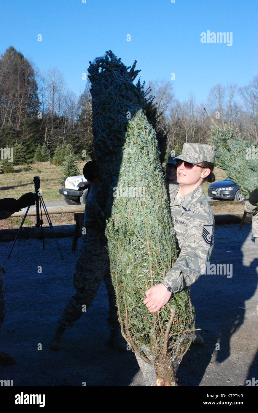 New York Air National Guard Master Sgt. Jennifer Dippo helps load ...