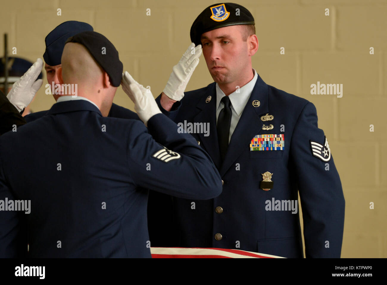 Members of the 105th Airlift Wing and 106th Rescue Wing pay their ...