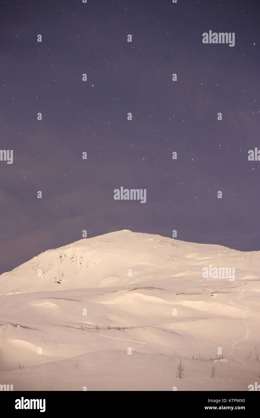 Clear Winter Night In The Mountain Stock Photo - Alamy