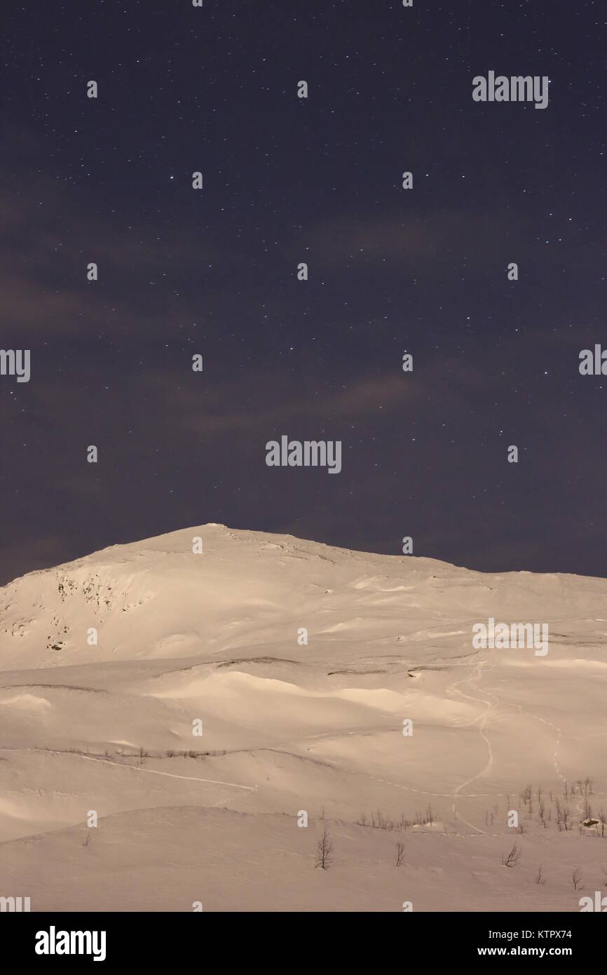 Clear Winter Night In The Mountain Stock Photo - Alamy
