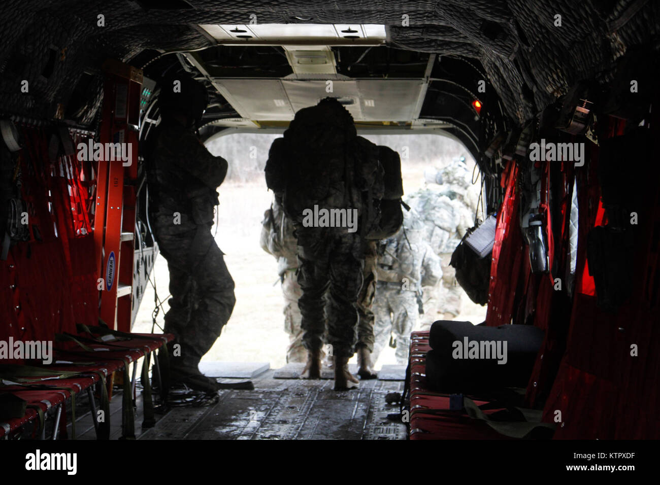 Soldiers of Troop C, 2nd Squadron, 101st Cavalry Regiment exit a CH-47 ...