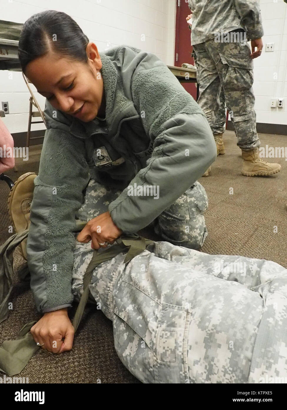 Pfc. Maria Cruz of the 42nd Infantry Division Headquarters and Support ...