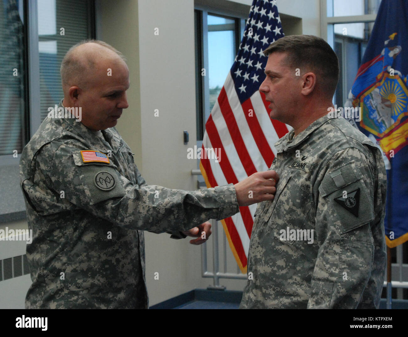 New York Army National Guard Lt. Col. Scott Cleaveland (left) is ...