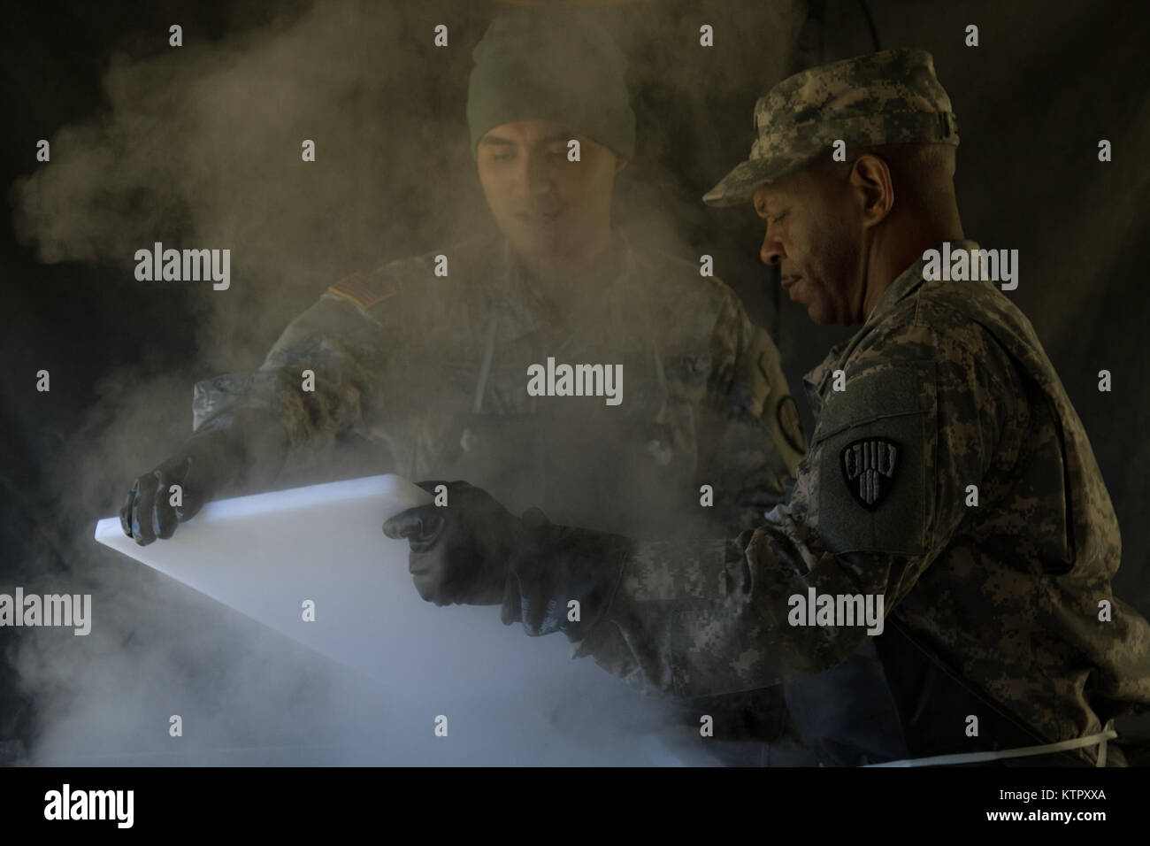New York Army National Guard Signal Sergeants Aron Donaldson (right ...