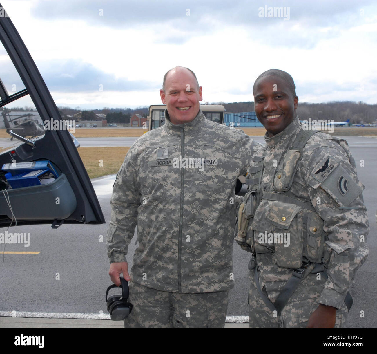 LATHAM, N.Y. -- Chief Warrant Officer 2 Franz Scott (right) poses with ...