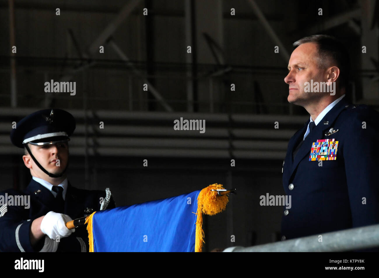 Tech. Sgt. Jonathan Guagenti, 105th Airlift Wing Honor Guard, unfurls ...