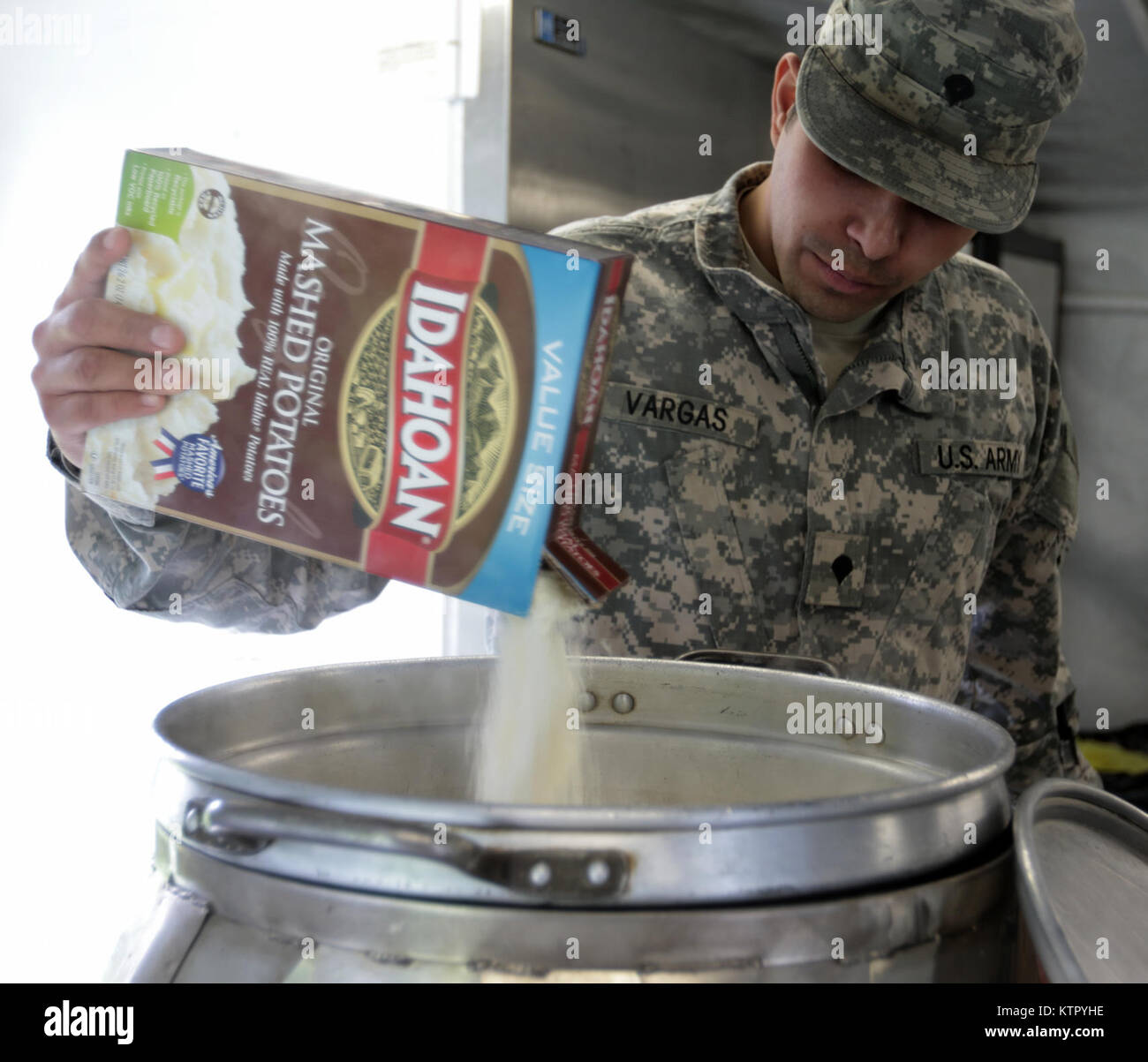 New York Army National Guard Spc. Ramon Vargas, a food service ...