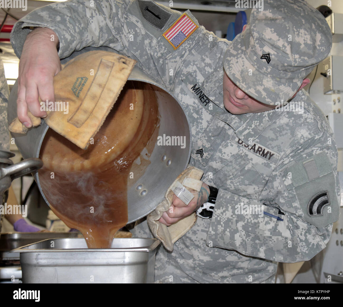 New York Army National Guard Sgt. Steven Miner, a food service ...