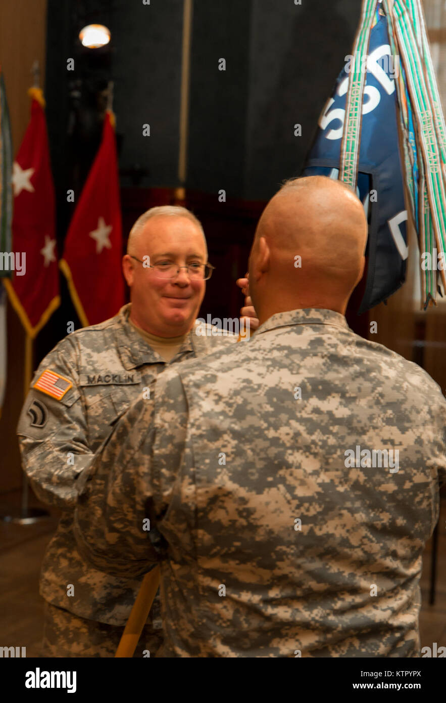 Col. Patrick R. Macklin passes the 53rd Digital Liaison Detachment's ...