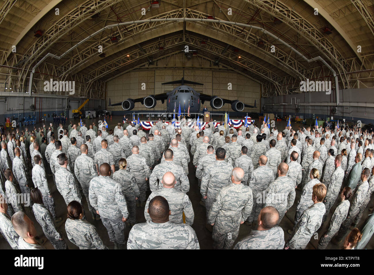 Members of the 105th Airlift Wing form up to witness a change of ...