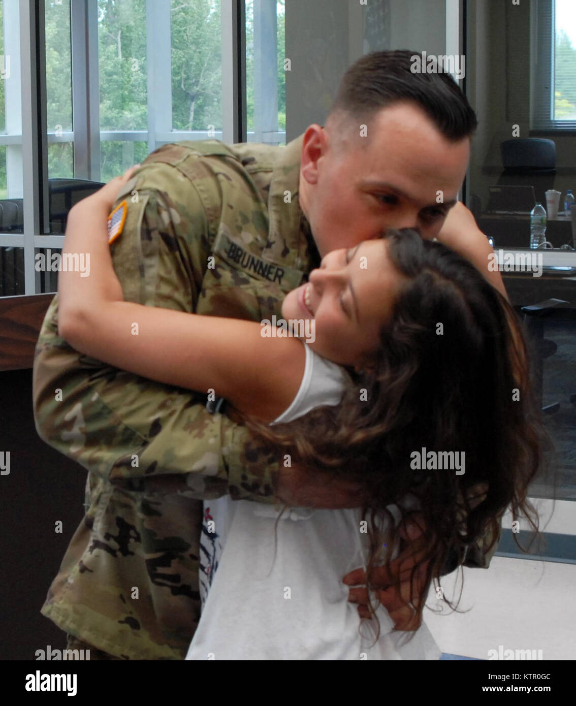 LATHAM, N.Y. – New York Army National Guard Soldier Daniel Brunner hugs ...