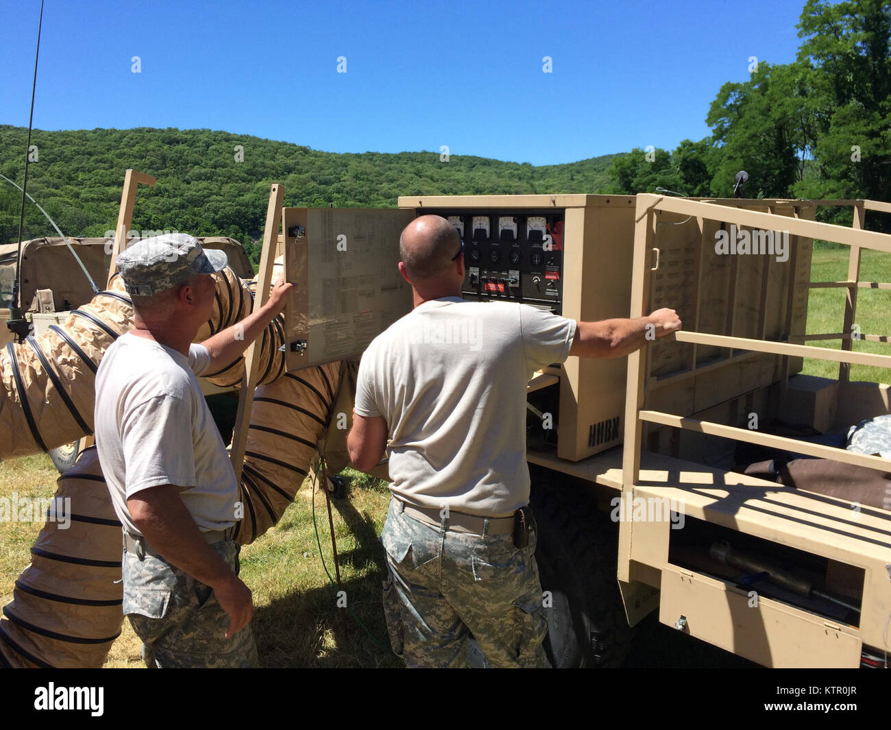 Camp Smith, NY – CW2 Lacroix and SSG Harris, assigned to HSC, prepare ...