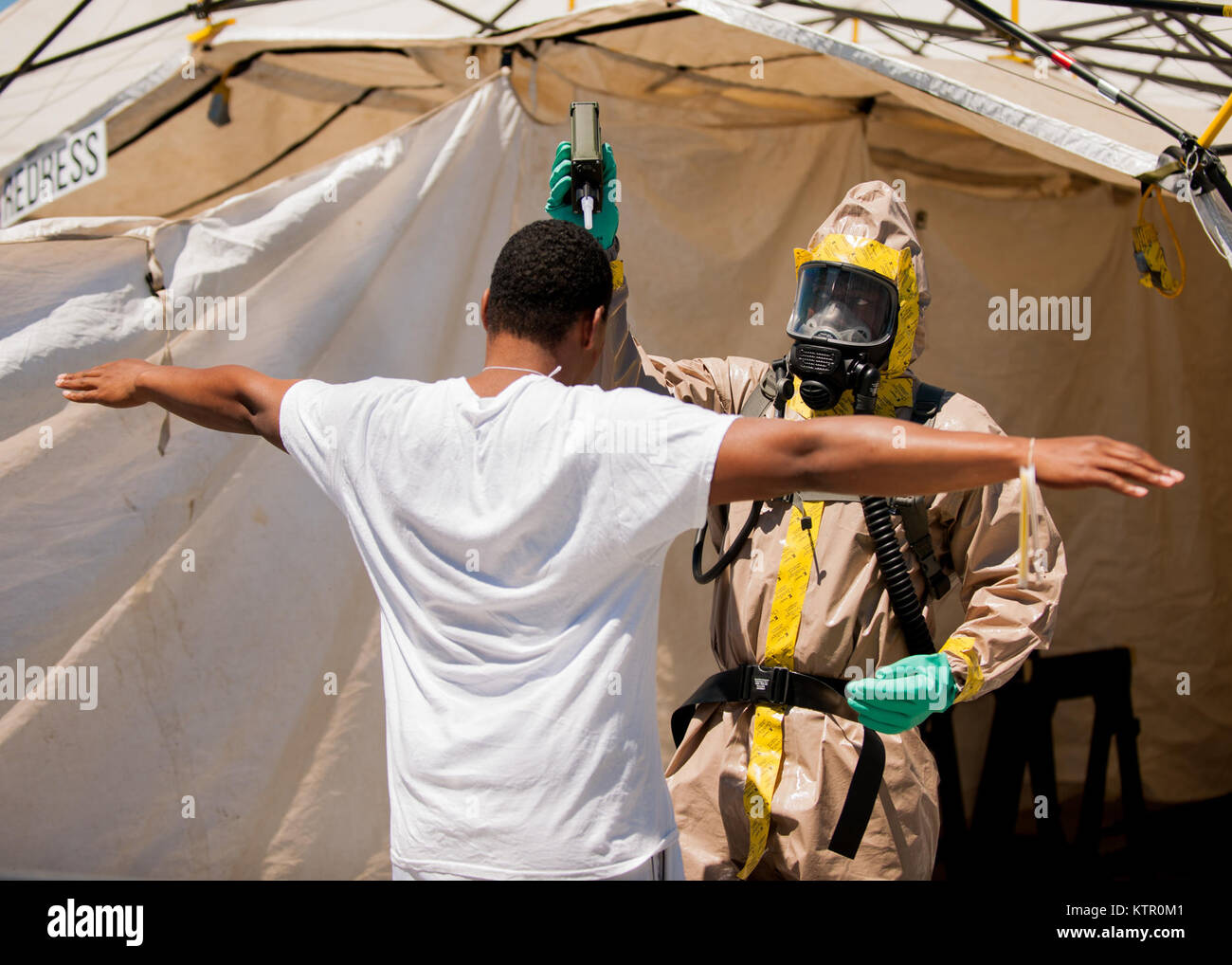 New York Air National Guard Tech. Sgt. Amir Butcher assists a role ...