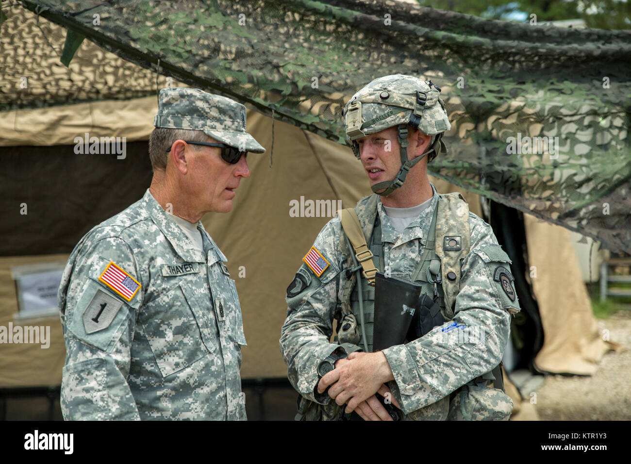 Command Sgt. Maj. William Thayer, left, senior enlisted advisor with ...