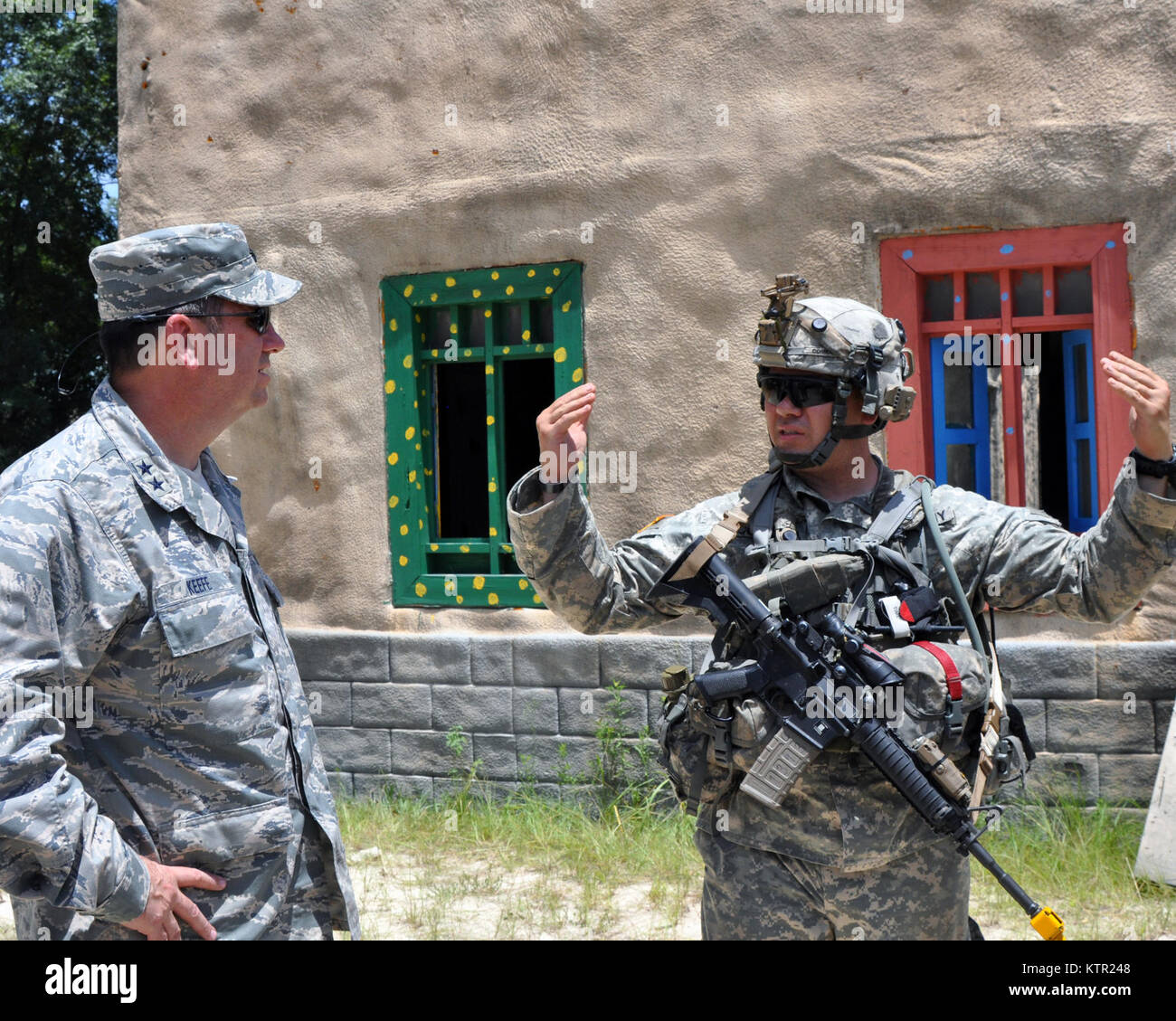 Massachusetts Army National Guard Command Sgt. Major Gary Comeau (right ...