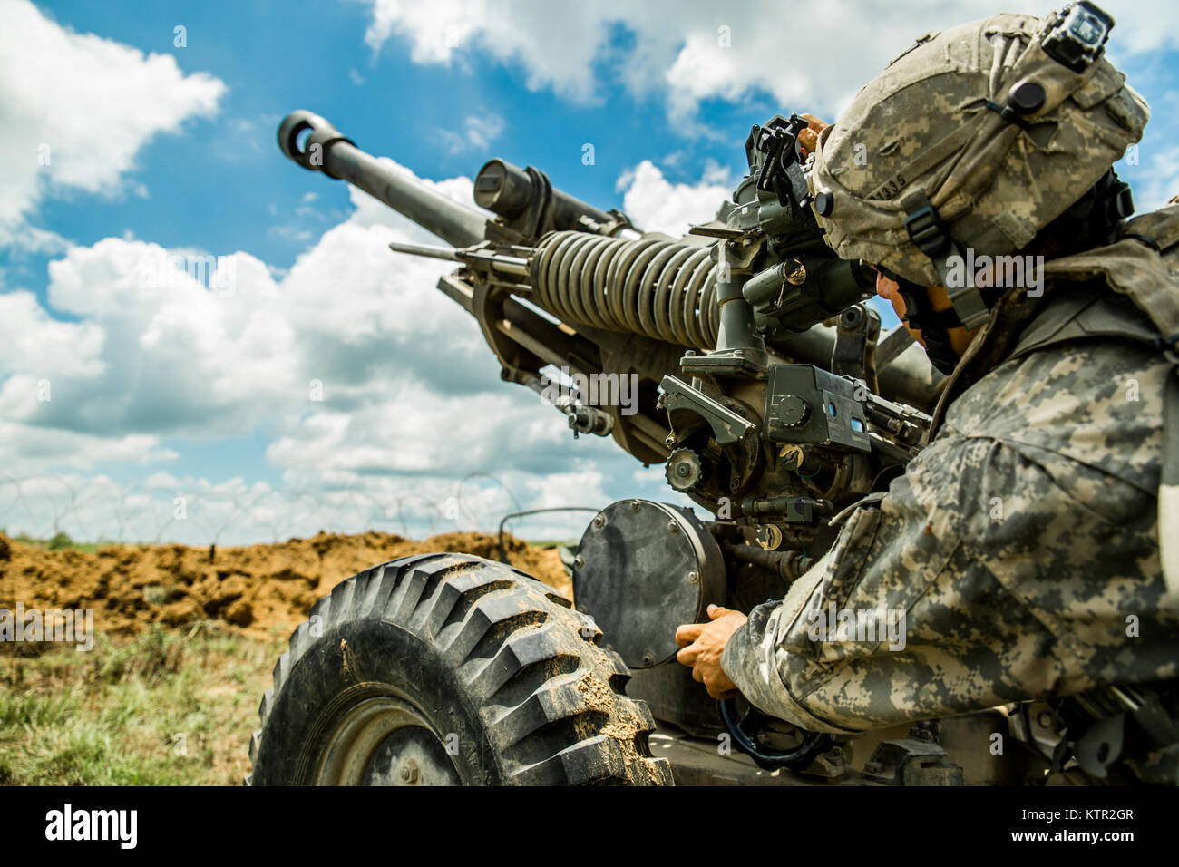 U.S. Army Sgt. Eric Paredes, a gunner with Battery B, 1st Battalion ...