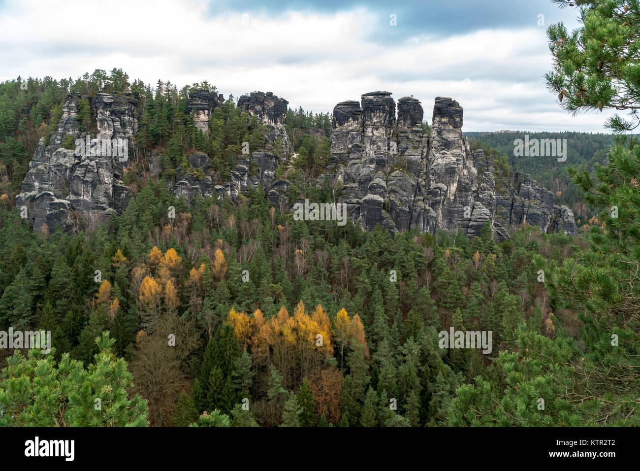 Iconic view of sandstone steep rocks in the forest during autumn in ...