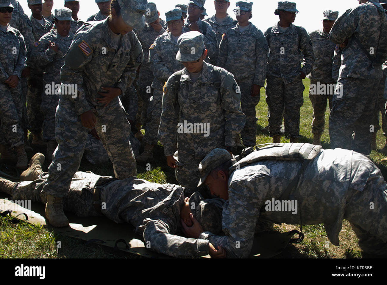 Soldiers of the 369th Sustainment Brigade, practice using a sked litter ...