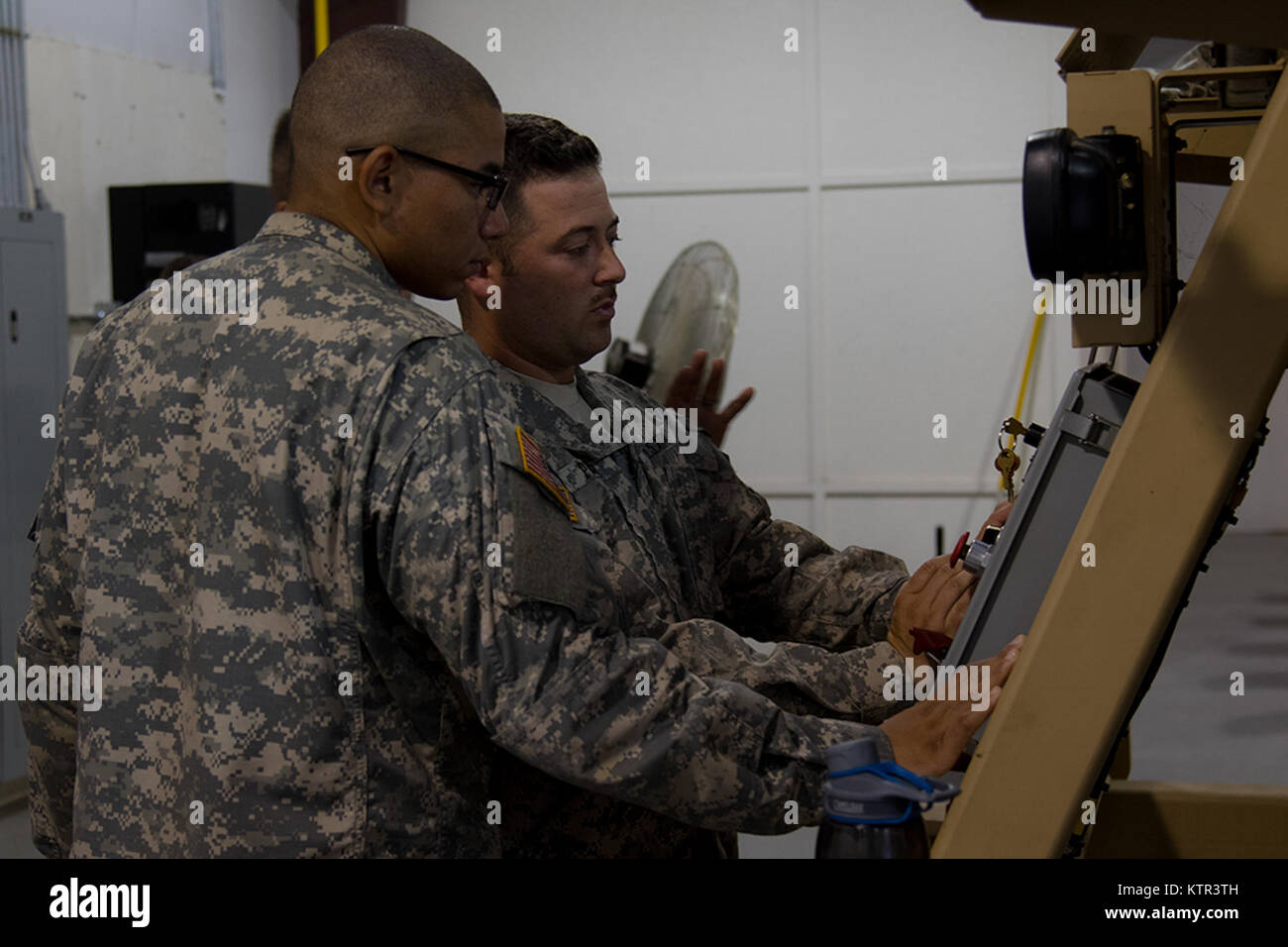 2nd Lt. Almonte and Sgt. Parker, operate an MRAP Egress Trainer (MET ...