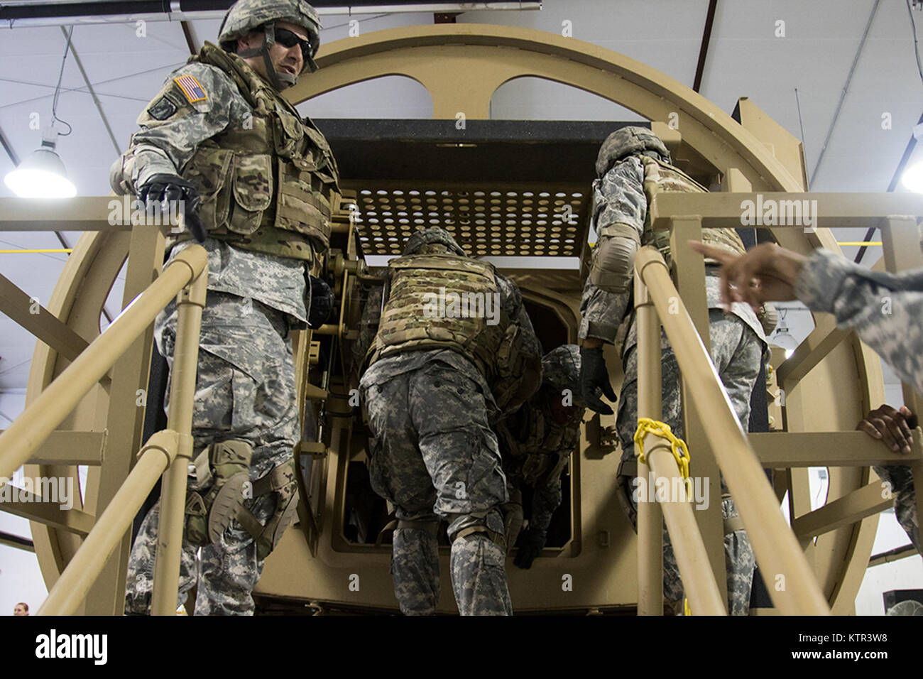 Soldiers of the 369th Sustainment Brigade train on an MRAP Egress ...