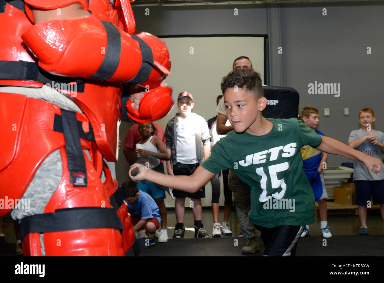 Elvis Freeman whacks a security forces Airman with a foam baton during ...