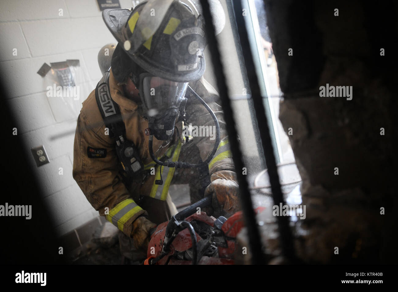 WESTHAMPTON BEACH, NY - Airman First Class Kyle Simpson, a firefighter ...