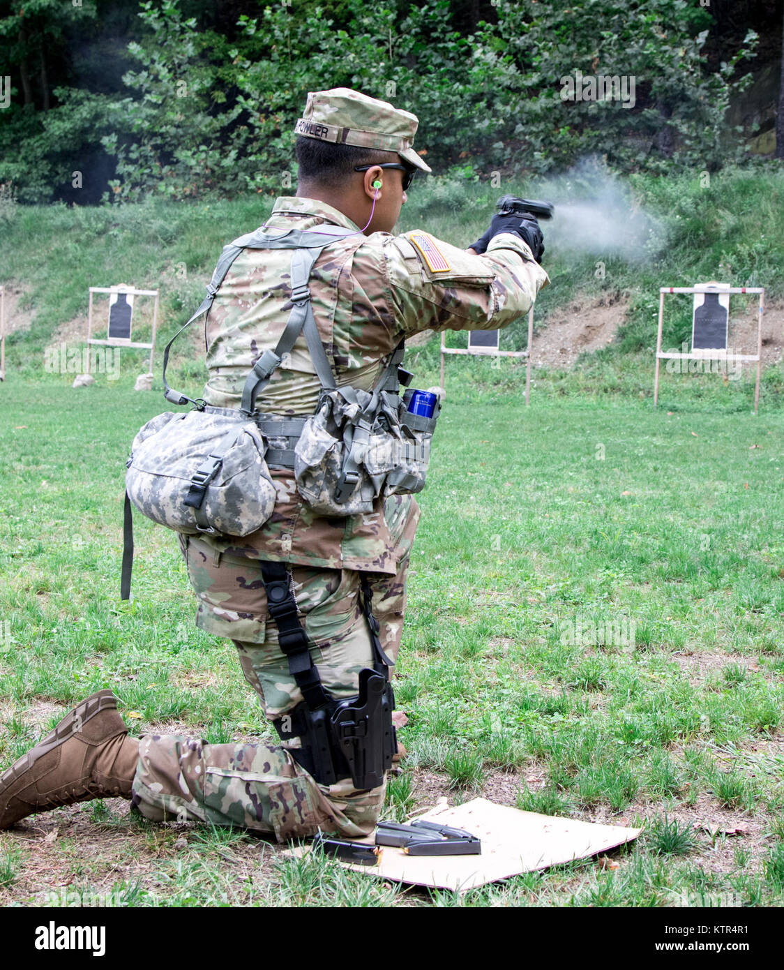 U.S. Army Spc. Justin Fowler, a military police Soldier assigned to the ...