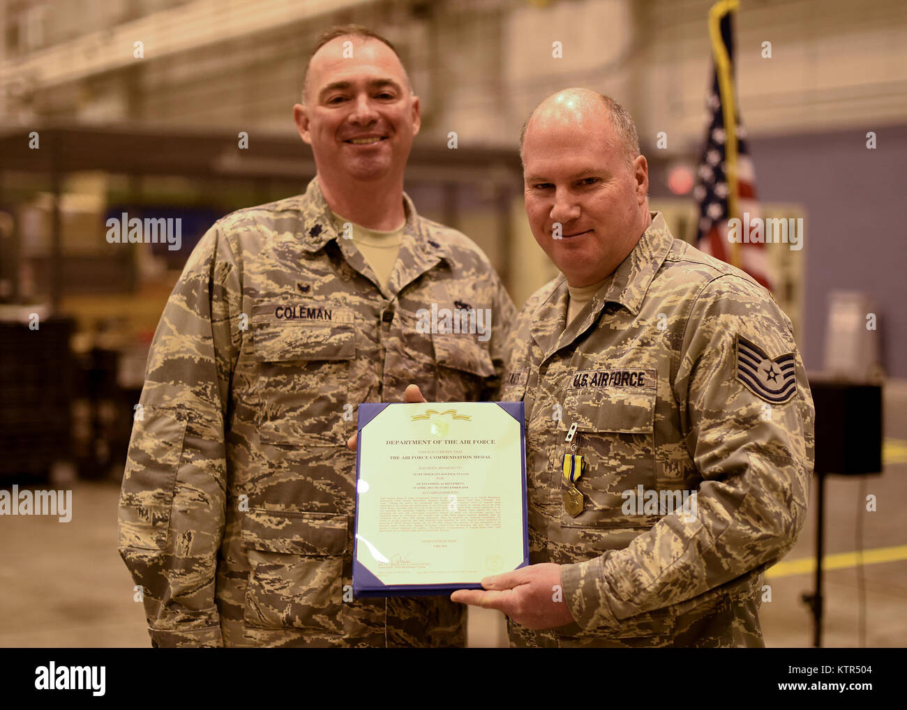 Lieutenant Col. Timothy Coleman presents Technical Sgt. Roger Staats ...
