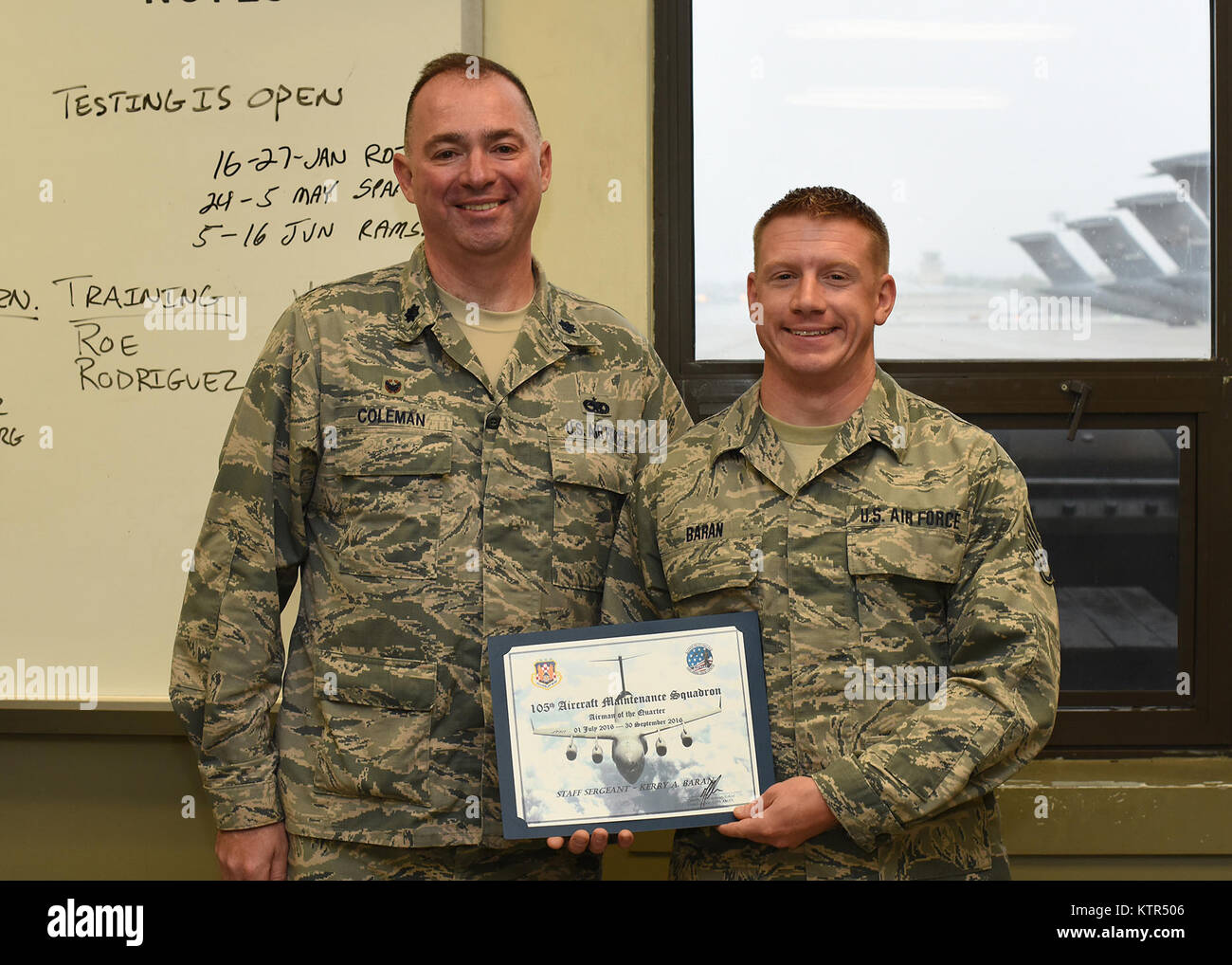 Lieutenant Col. Timothy Coleman recognizes Staff Sgt. Kerry Baran as ...