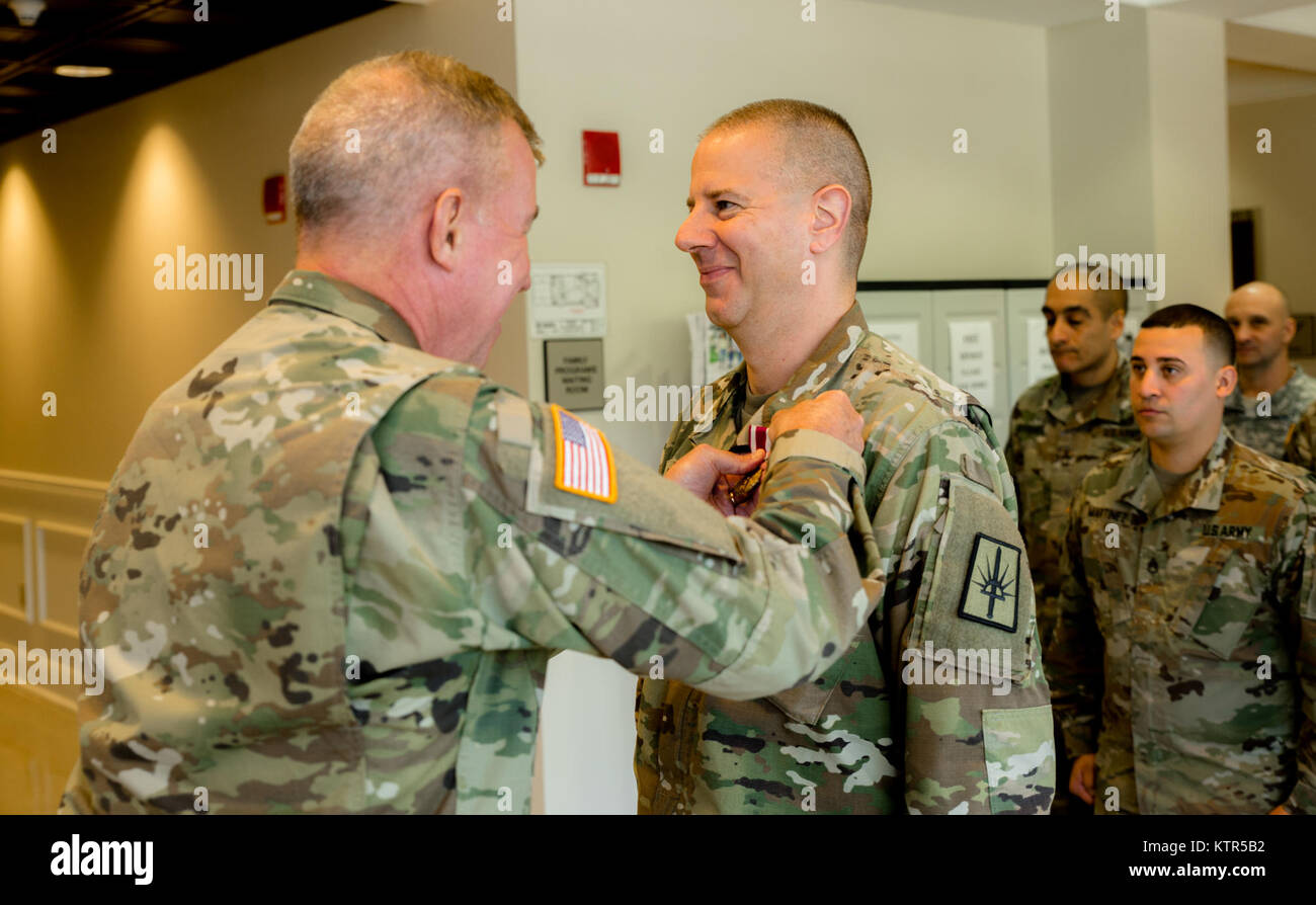 53rd Troop Command, receives a Meritorious Service Medal in recognition ...