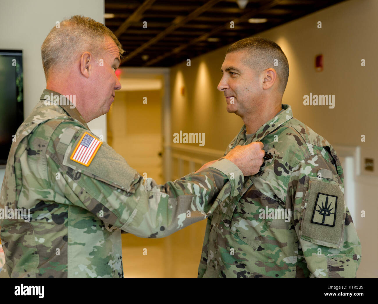 53rd Troop Command, receives a Meritorious Service Medal in recognition ...