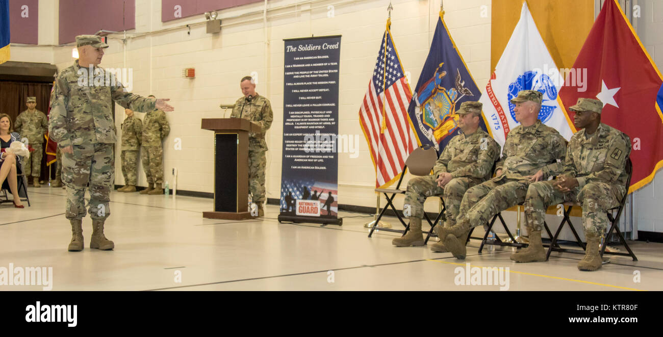 Brig. Gen. Raymond Shields (left) speaks to Col. Michel A. Natali, the ...
